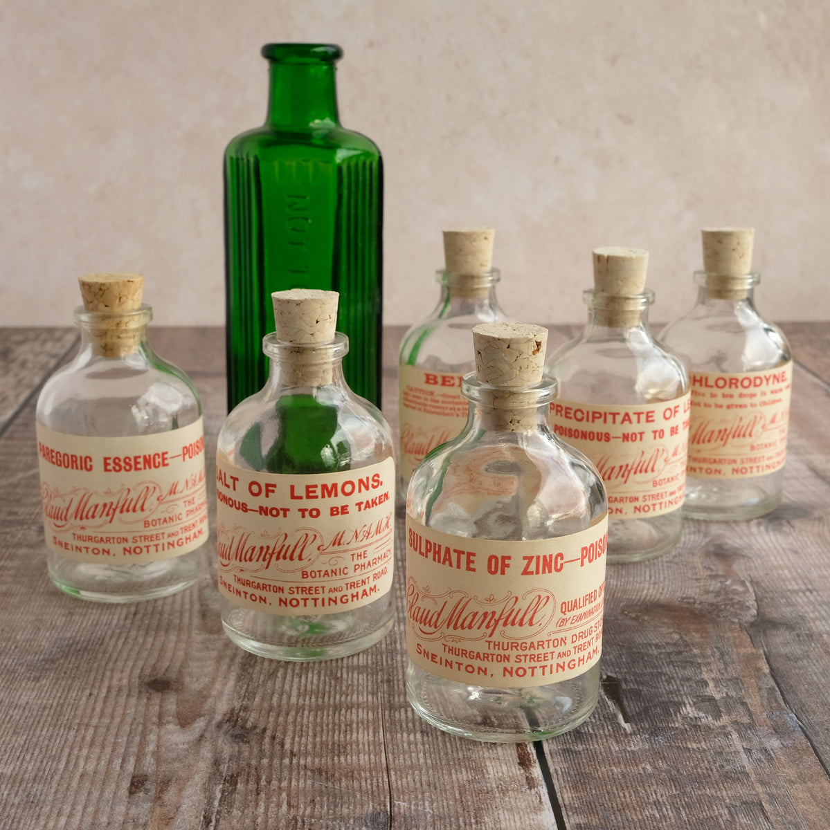 Small apothecary poison bottle featuring an original vintage label wit ...